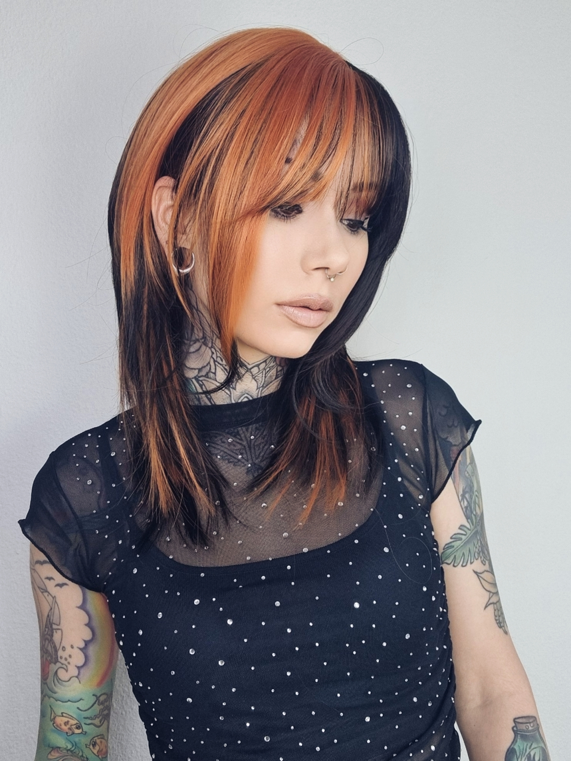 Black and burnt orange layered wig with bangs | Qorax by Lush Wigs UK